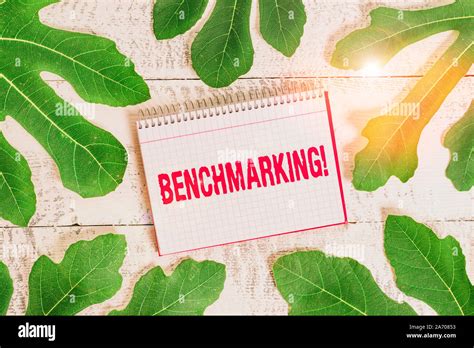 Conceptual Hand Writing Showing Benchmarking Concept Meaning Evaluate