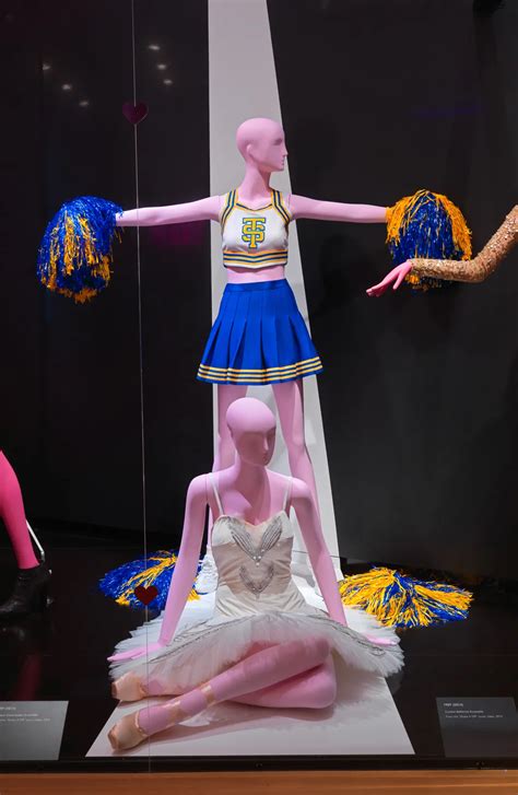At New Exhibition Taylor Swifts Outfits Never Go Out Of Style