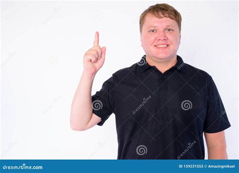 Portrait Of Happy Overweight Man Pointing Up Stock Image Image Of