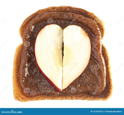 Un Trozo De Pan De Trigo Tostado Con Mantequilla De Manzana De Canela