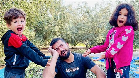 بنت صغيرة تساعد ابوها في قطف الزيتون شوف حصل اية Youtube
