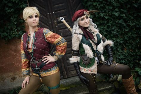 Two Women Dressed In Costume Posing For A Photo