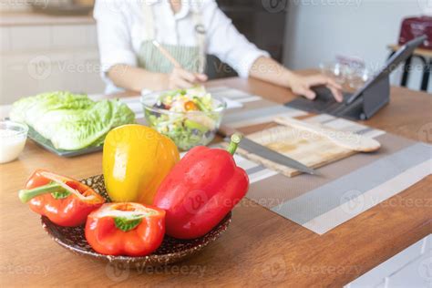Young Woman Preparing Bell Pepper As A Breakfast Ingredient And Ready