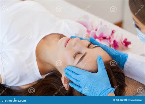 Young Woman Getting Spa Massage Treatment At Beauty Spa Salon Stock