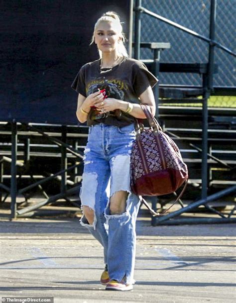 Gwen Stefani Encapsulates Rocker Chic In Vintage Tee And Ripped Jeans