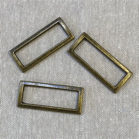 Rectangle Ring 1 ½ In Antique Brass Stitchbird