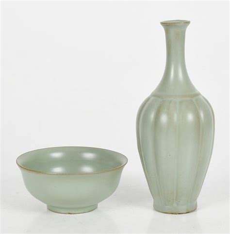 Two Pieces Of Chinese Celadon Glazed Pottery Sold At Auction On 16th