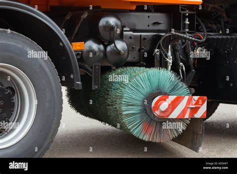 Brushs of street cleaning machine - close up Stock Photo - Alamy