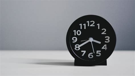 Download Plain Black Analog Alarm Clock Wallpaper