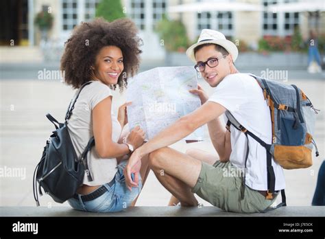 Couple Reading The Map Stock Photo Alamy