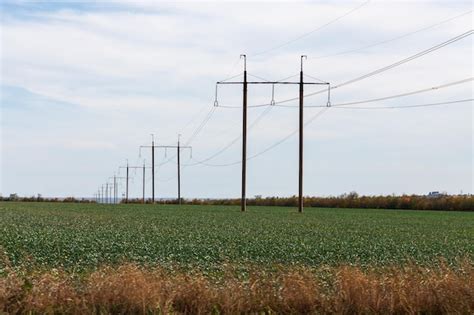 premium photo overhead power lines in the countryside