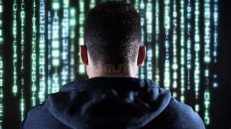 Generative Ai Silhouette Of A Person With Back Turned Against A Backdrop Of Green Binary Code