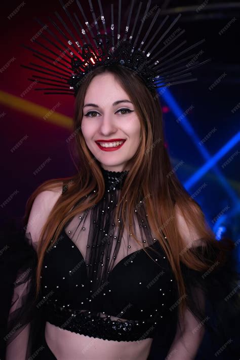 Premium Photo Portrait Of A Beautiful Gogo Dancer Posing On The Stage