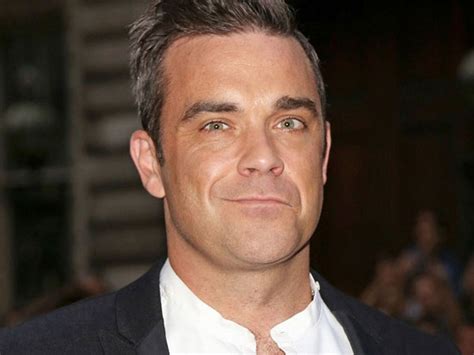 El Insólito Tatuaje Que Un Fan De Robbie Williams Se Hizo En El Trasero