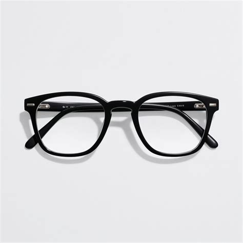 A Pair Of Black Glasses With A Black Frame And A Silver Clasp Premium
