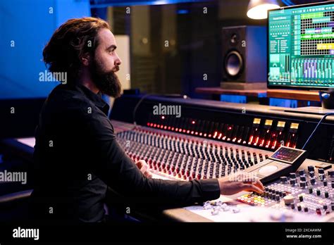 Tracking Engineer Editing New Music With Digital Audio Software And