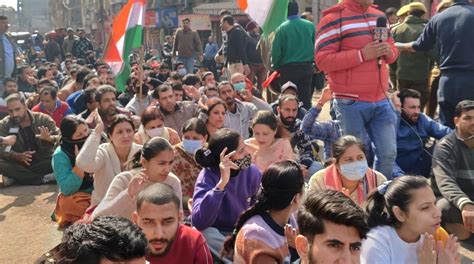 kashmiri pandit other employees stage sit in outside raj bhavan the