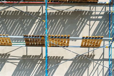 Premium Photo Scaffolding Is Installed Along The Wall Of The Building