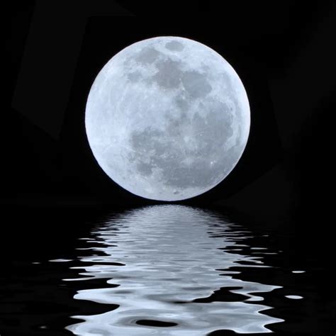 Full Blue Moon Over Water With Reflections Stock Photo By Danielkrol85