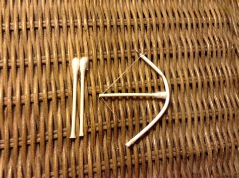 Made A Mini Bow And Arrow Out Of A Pen Dental Floss Q Tips And A Pair