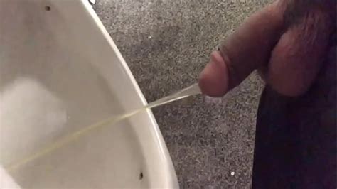 Young Guy I Shake Pissing Without His Hand In The Nightclubs Bathroom