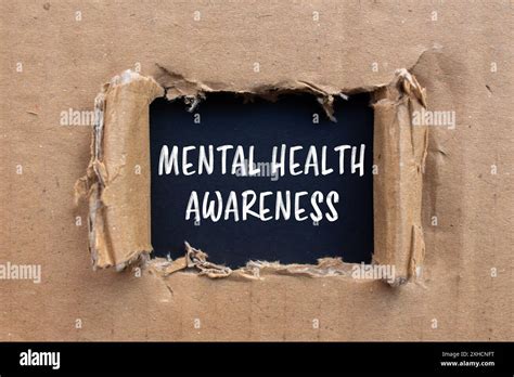Mental Health Awareness Message Written On Ripped Cardboard Paper With