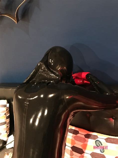 Show Full Rubber Slave Serving His Leather Master BootedRAY