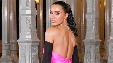 Kim Kardashian Gives Fans A Glimpse At Her Bare Butt As She Slips Out