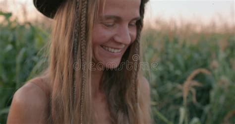 Man Giving Sweet Corn Kernel To His Smiling Girlfriend Stock Footage