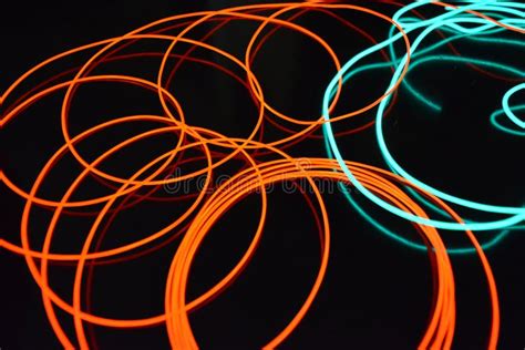 Unusual Glowing Blue And Red Thread Twisting Wire Structural And Curved Electroluminescent