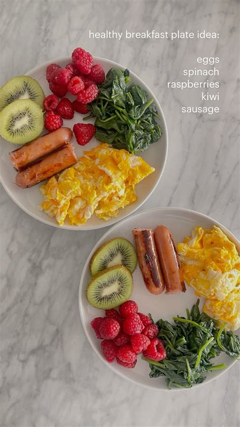 Healthy Breakfast Plate Idea Eggs Spinach Raspberries Kiwi Sausage