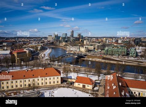 Vilnius City Centre Covered In Snow Panorama With King Mindaugas Bridge