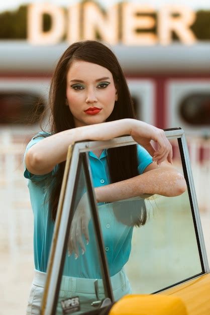 Free Photo Woman Posing In Retro Style Next To Car
