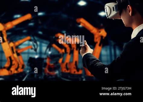 Engineer Use Cybernated Robotic Software To Control Industry Robot Arm In Factory Automation