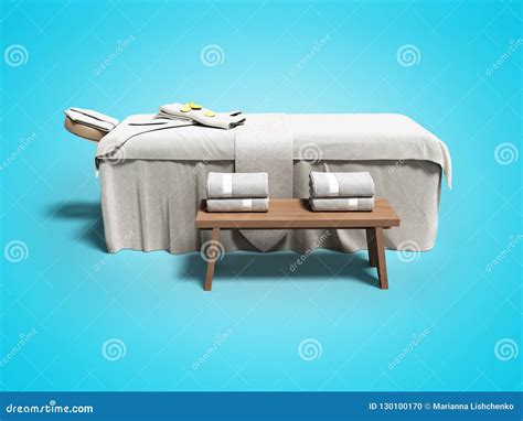 Modern White Massage Bed With Folded Towels 3d Render On Blue