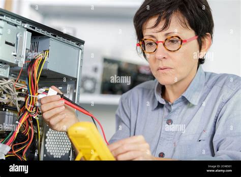 A Woman Checking Pc Problem Stock Photo Alamy