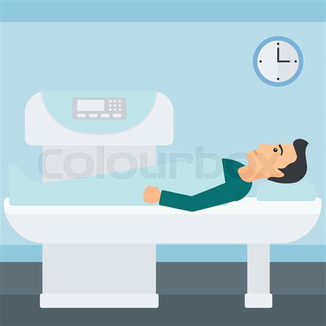 A Man Undergoes An Open Magnetic Resonance Imaging Scan Proc Colourbox