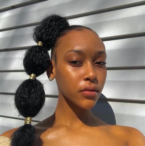 Puffballs Are The Latest Protective Style Taking Over The Internet