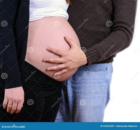 Man Holding Belly Of His Pregnant Wife Stock Photo - Image: 42452208
