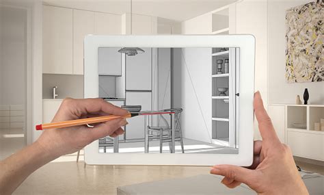 손 들고 및 태블릿 보여주는 현대 부엌 Cad 스케치 배경 건축 인테리어 디자인 프레 젠 테이 션에서에서 실제 완성 된 미니 멀 화이트 주방 디자인 전문가에 대한 스톡 사진