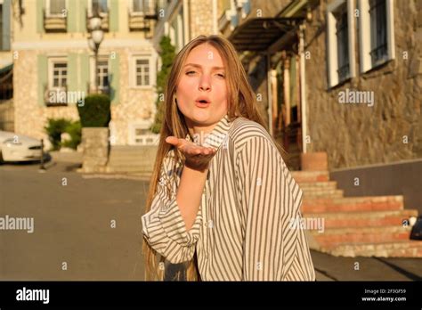 Young Beautiful Blonde Sending Passionate Kiss To The Camera Stock