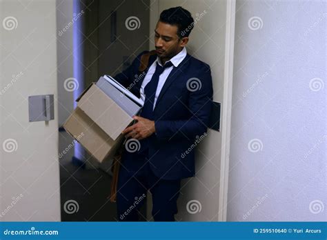 Hes Out The Door A Handsome Young Businessman Looking Depressed After