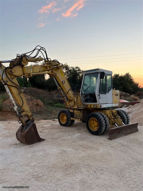 Car Gr Μηχάνημα εκσκαφέας με λάστιχα 93 3 08