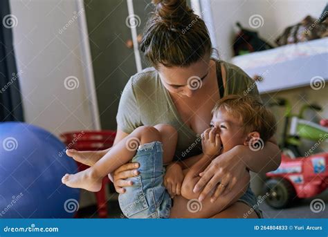 Its All Fun And Games With Mom A Young Woman Bonding With Her Son At