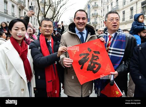 Mr YU Jiang Consul General Of China Poses For A Photo With The Flag