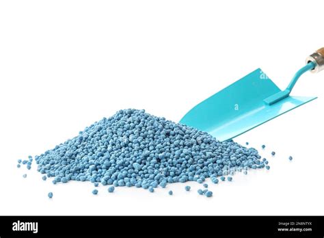 Pile Of Granular Mineral Fertilizer With Shovel On White Background