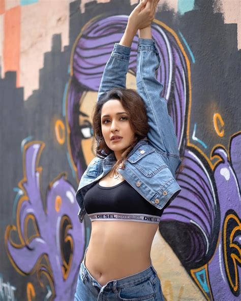 Pragya Jaiswal Sultry Photoshoot In Denim Shorts And Diesel Jacket In
