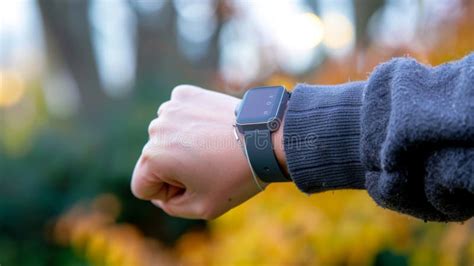 A Wearable Fall Detection Device Attached To A Persons Wrist Providing