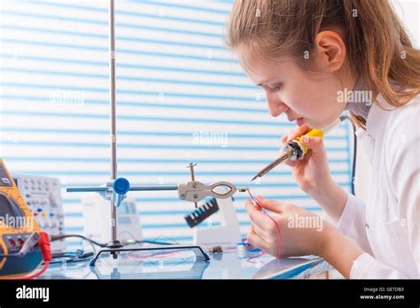 Girl Solder Wires Stock Photo Alamy
