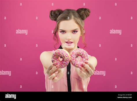 Nice Woman With Donuts On Vivid Yellow Background Diet Concept Stock